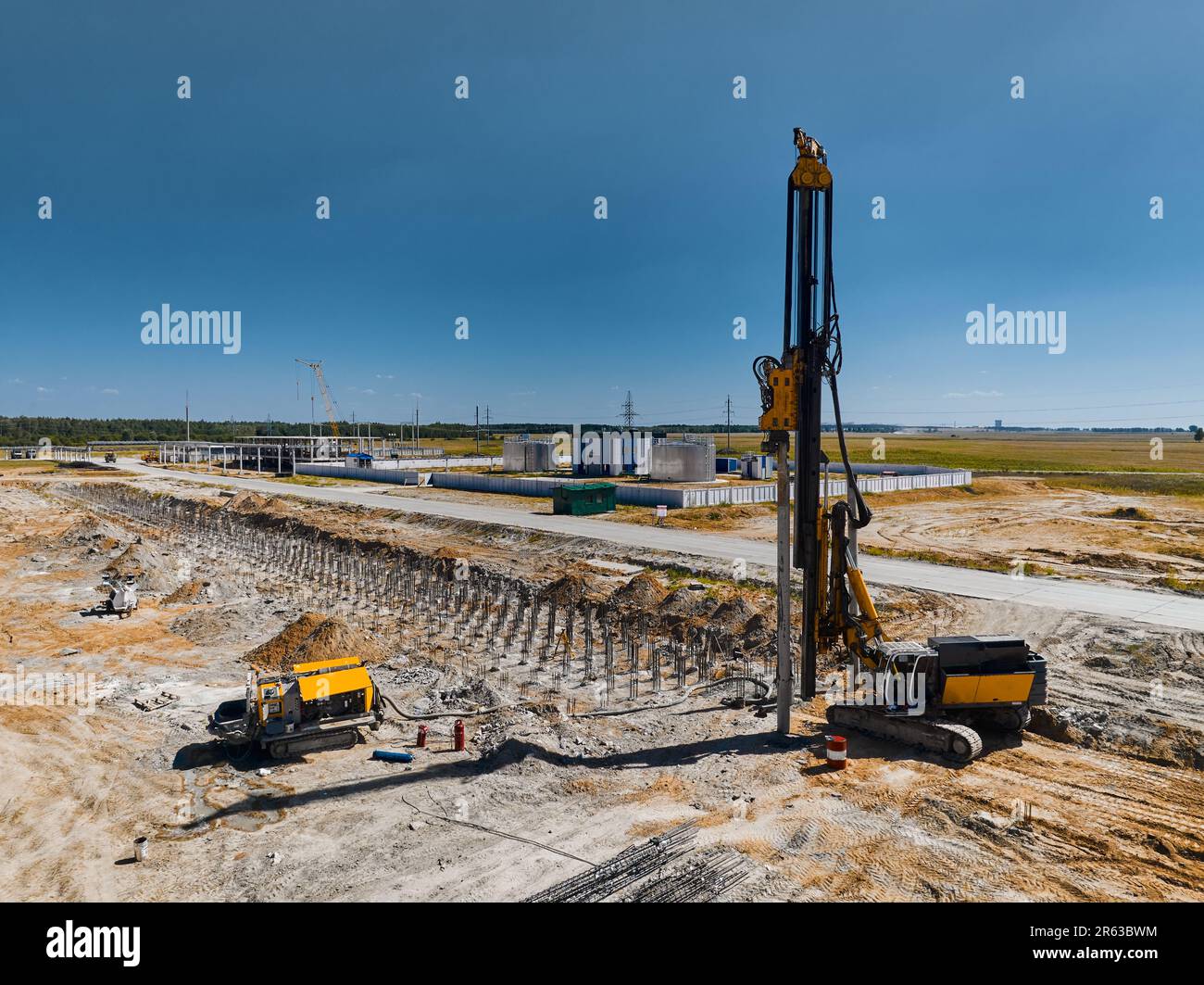 Drilling rig for constructing new mine on pile field Stock Photo - Alamy