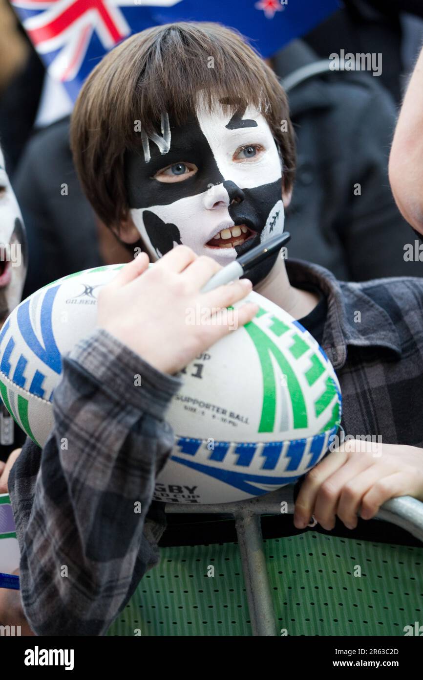 A young fan with a new rugby ball hi-res stock photography and images ...