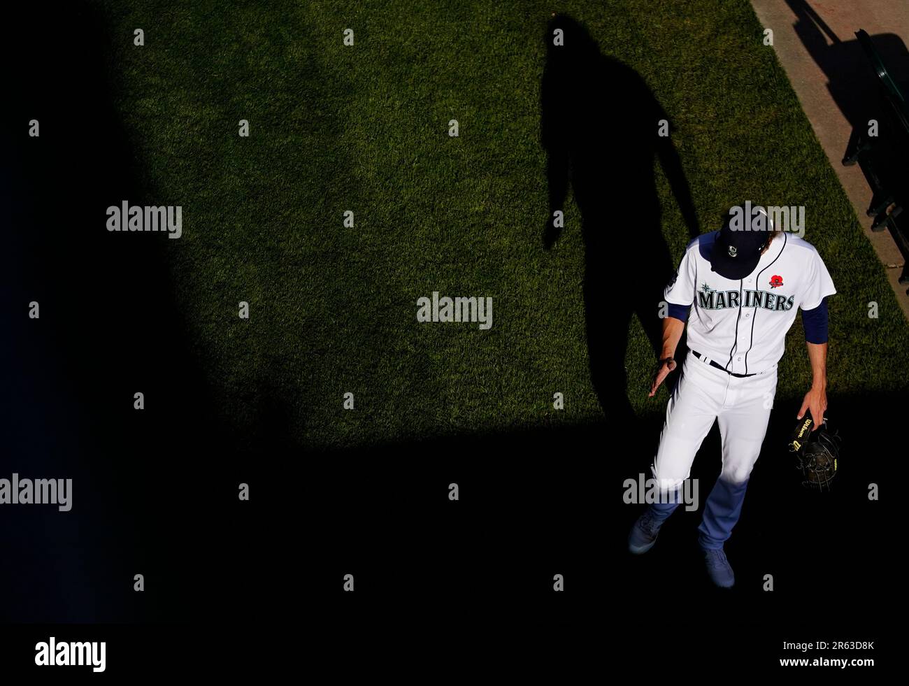 Seattle Mariners starting pitcher Bryce Miller walks in the bullpen ...