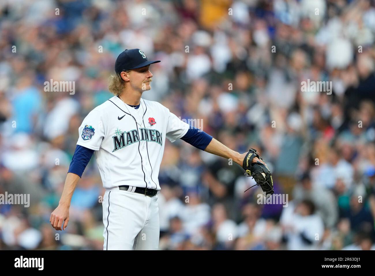 Seattle Mariners starting pitcher Bryce Miller reacts after giving up a ...