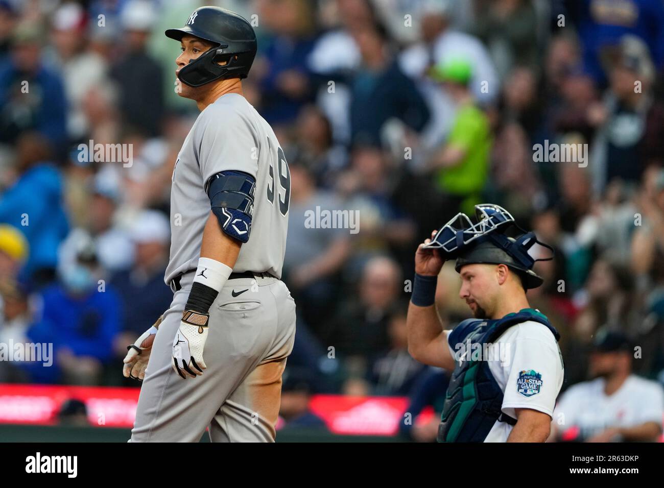 New York Yankees' Aaron Judge looks back after hitting a home run ...