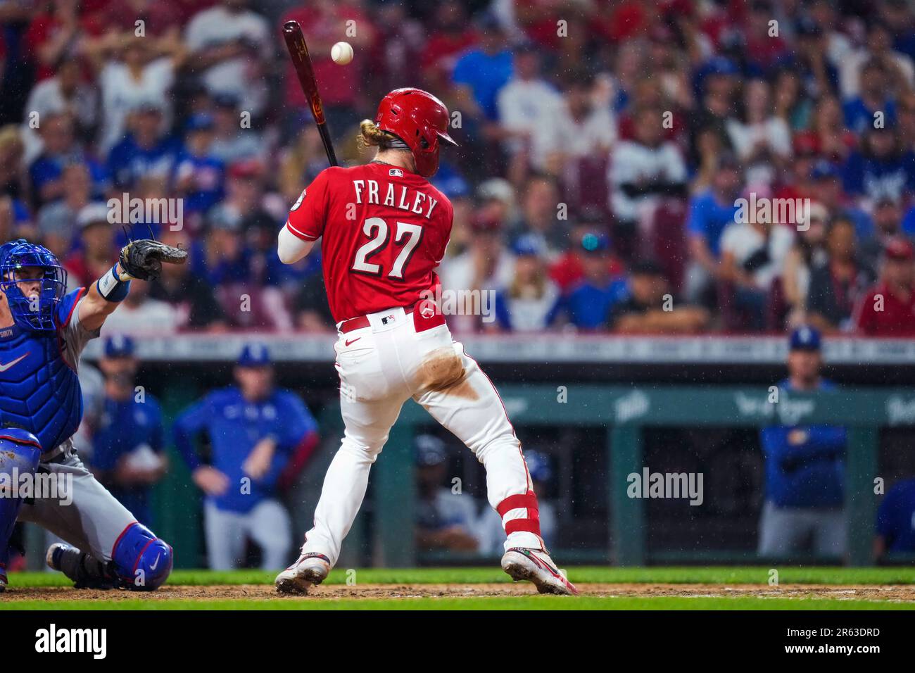 Cincinnati Reds' Jake Fraley reacts as he is hit by a pitch during the ...