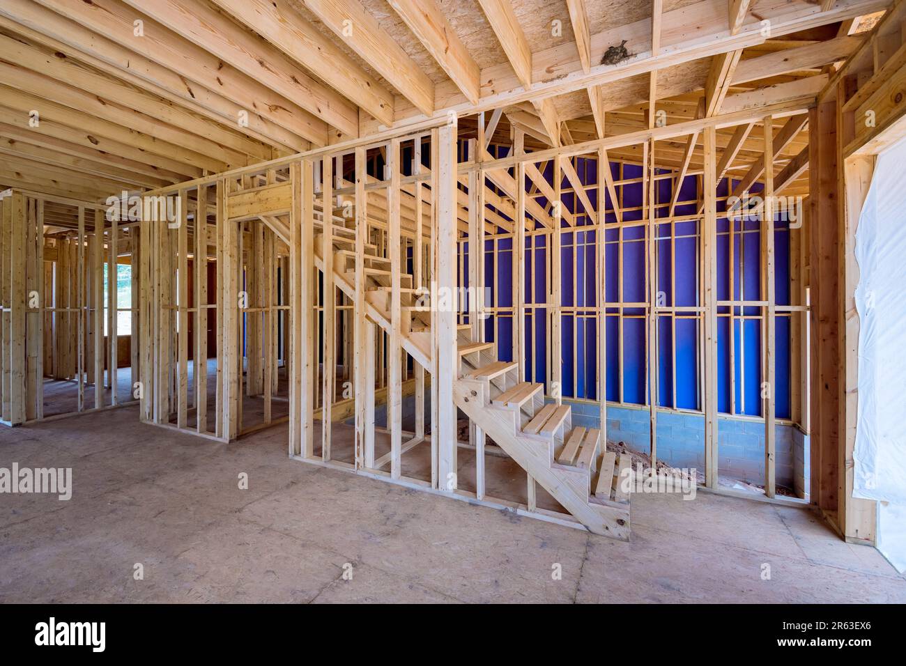Under construction new house requires installation wooden beams as ...