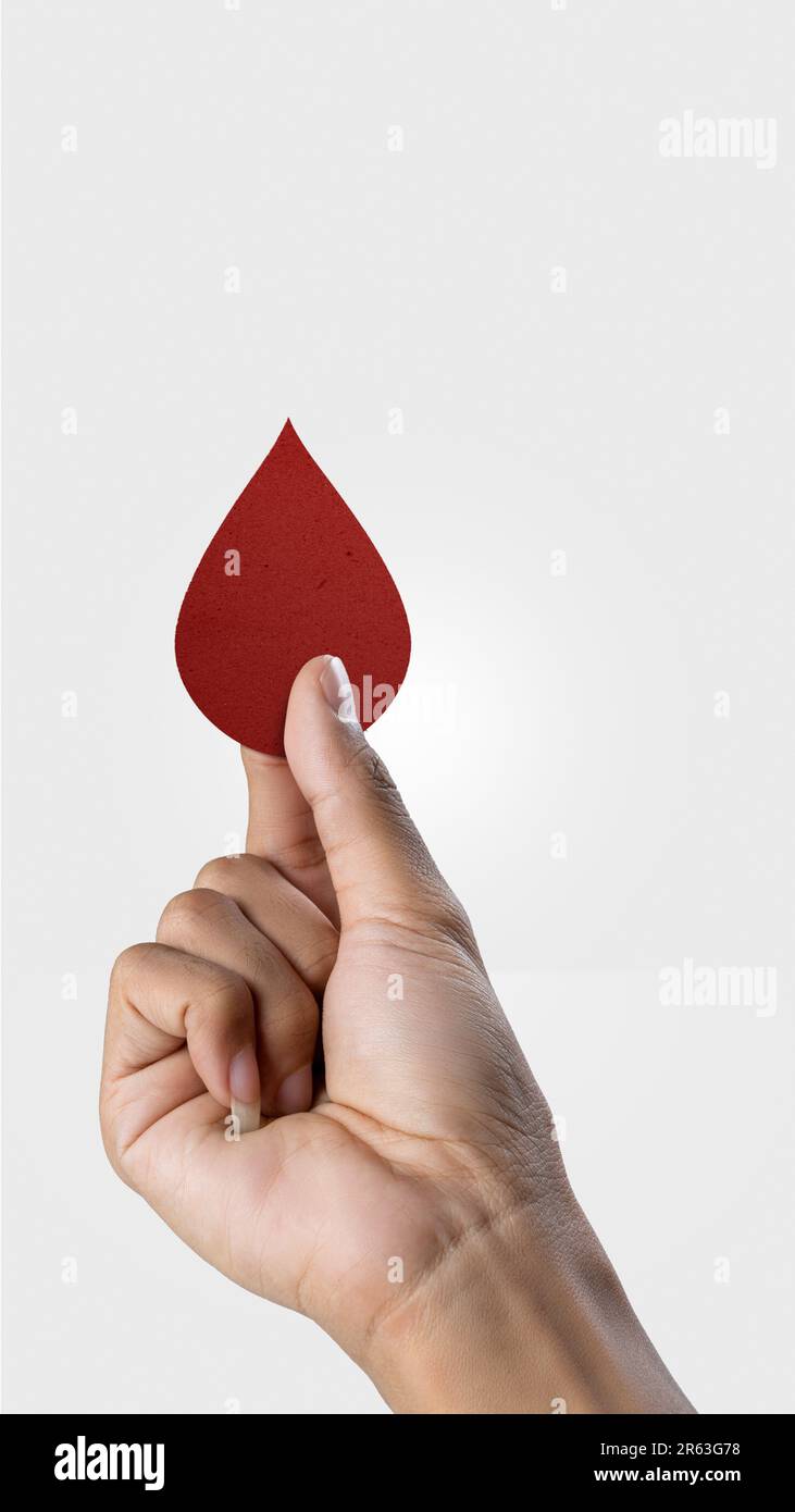 Human hand showing red blood drop isolated over white background Stock ...