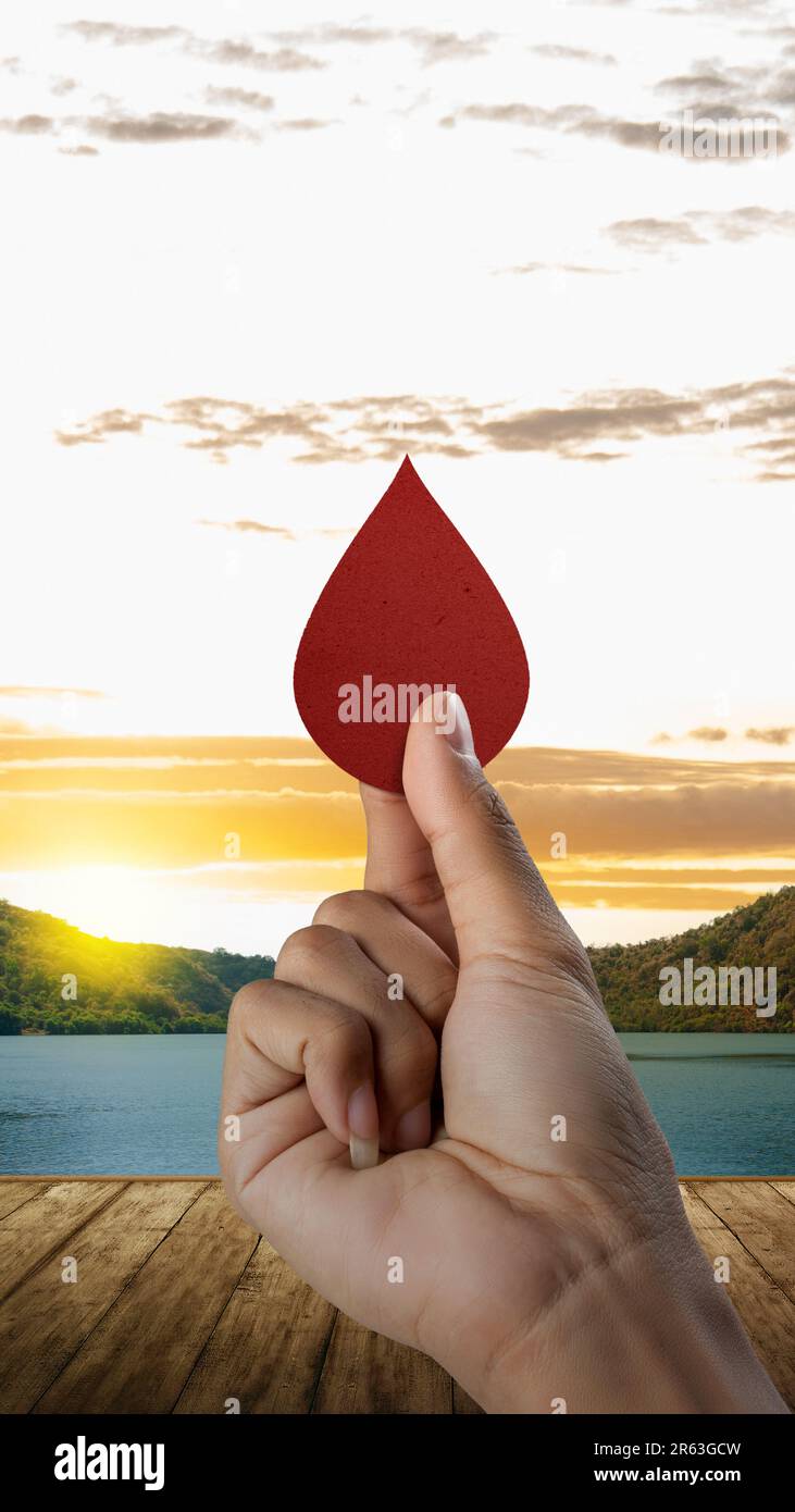 Human hand showing red blood drop. World blood donor day concept Stock ...