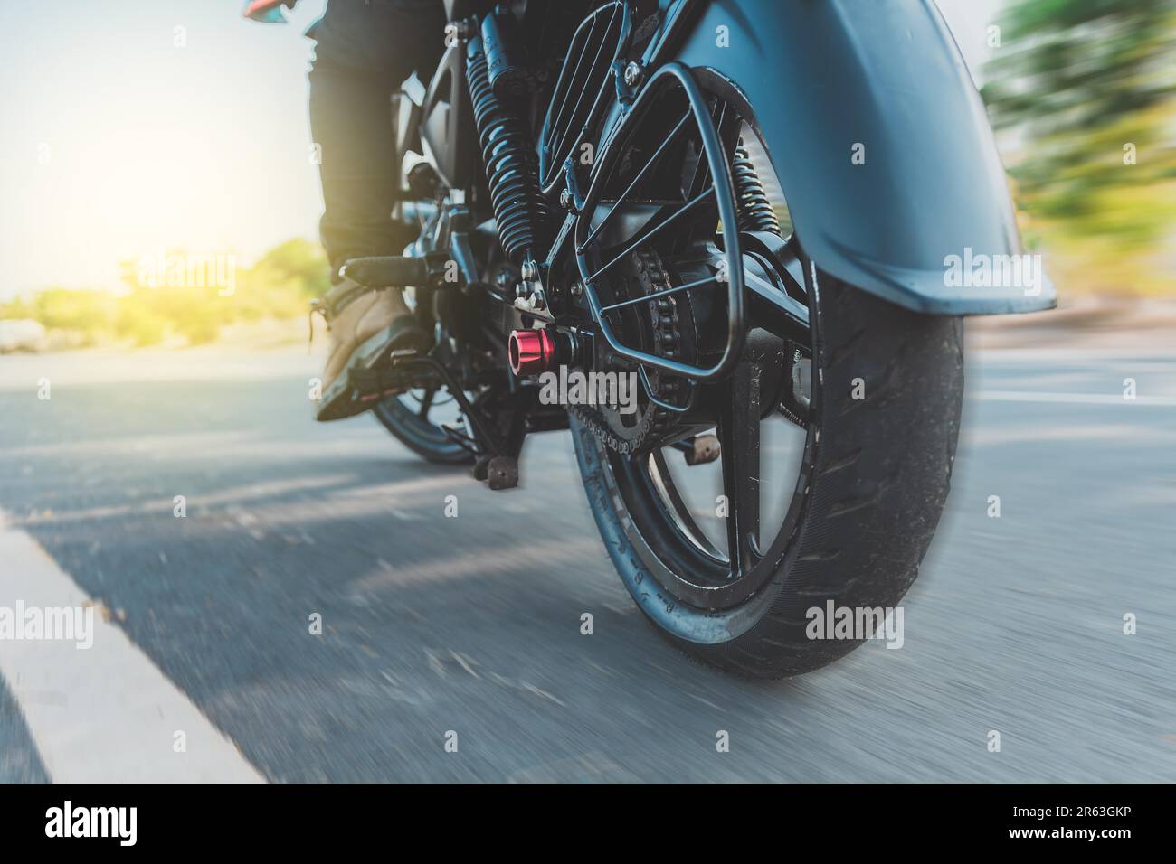 Biker riding motorcycle low angle hi-res stock photography and images ...