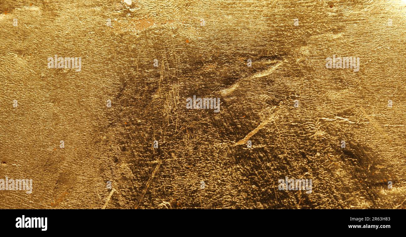 In gold painted wood texture using as luxury or festive background ...