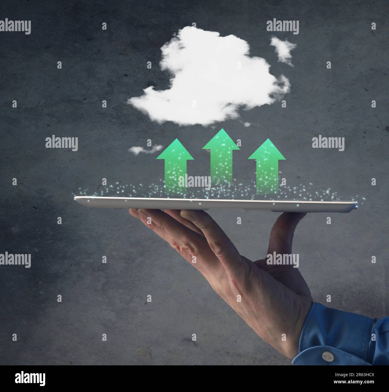 Businessman with a table and green cloud computing concept, data ...