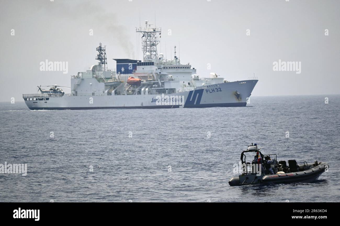 The Japan Coast Guard patrol boat Akitsushima takes part in a joint drill with the Philippine ...