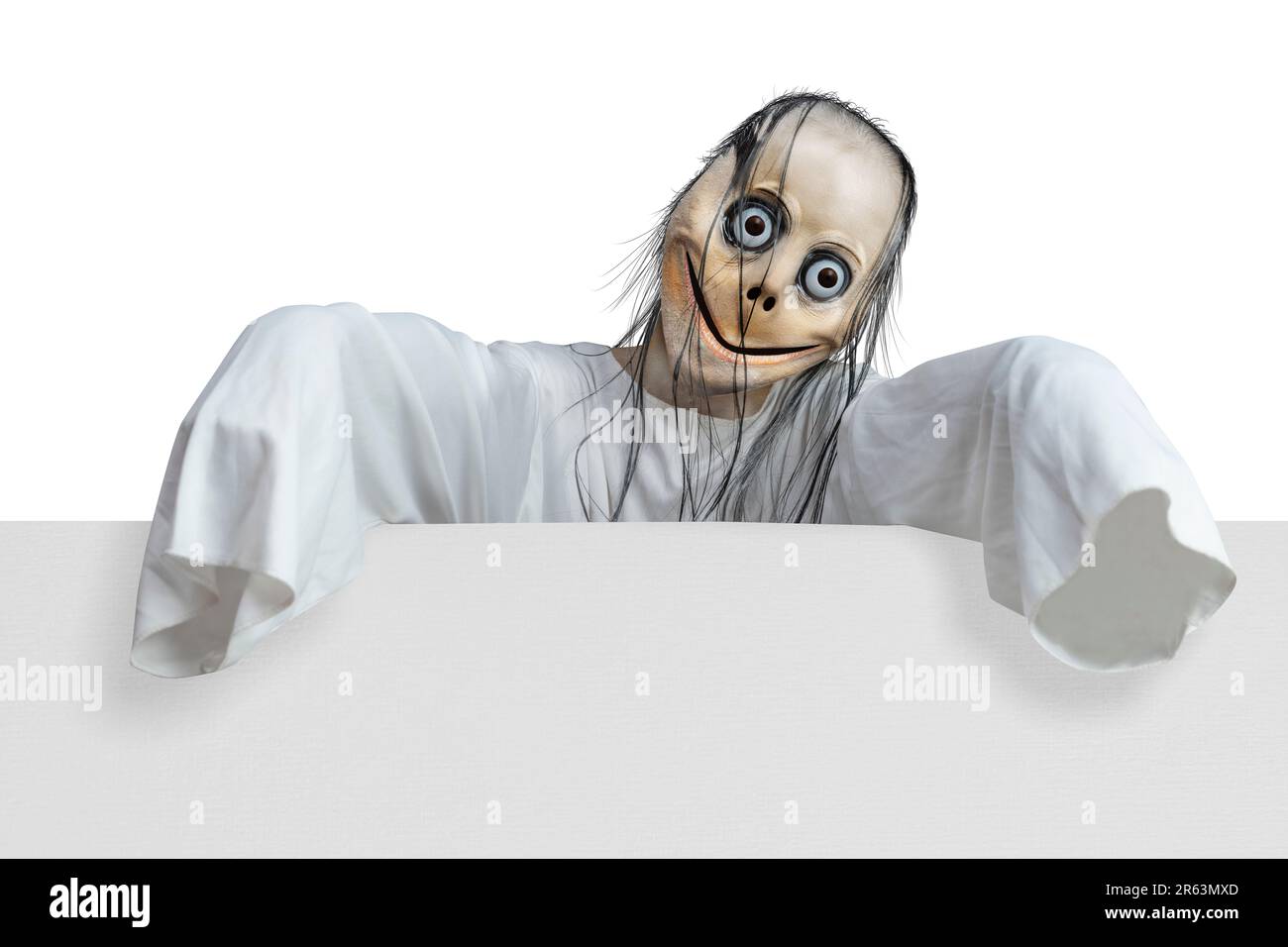 Scary Momo standing behind the wall on white background. Scary face for ...