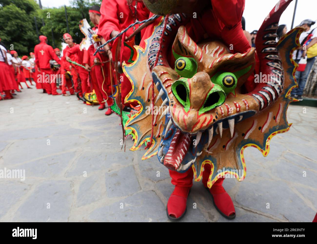 A Yare Dancing Devil shows his mask attached to his chest. Every year ...