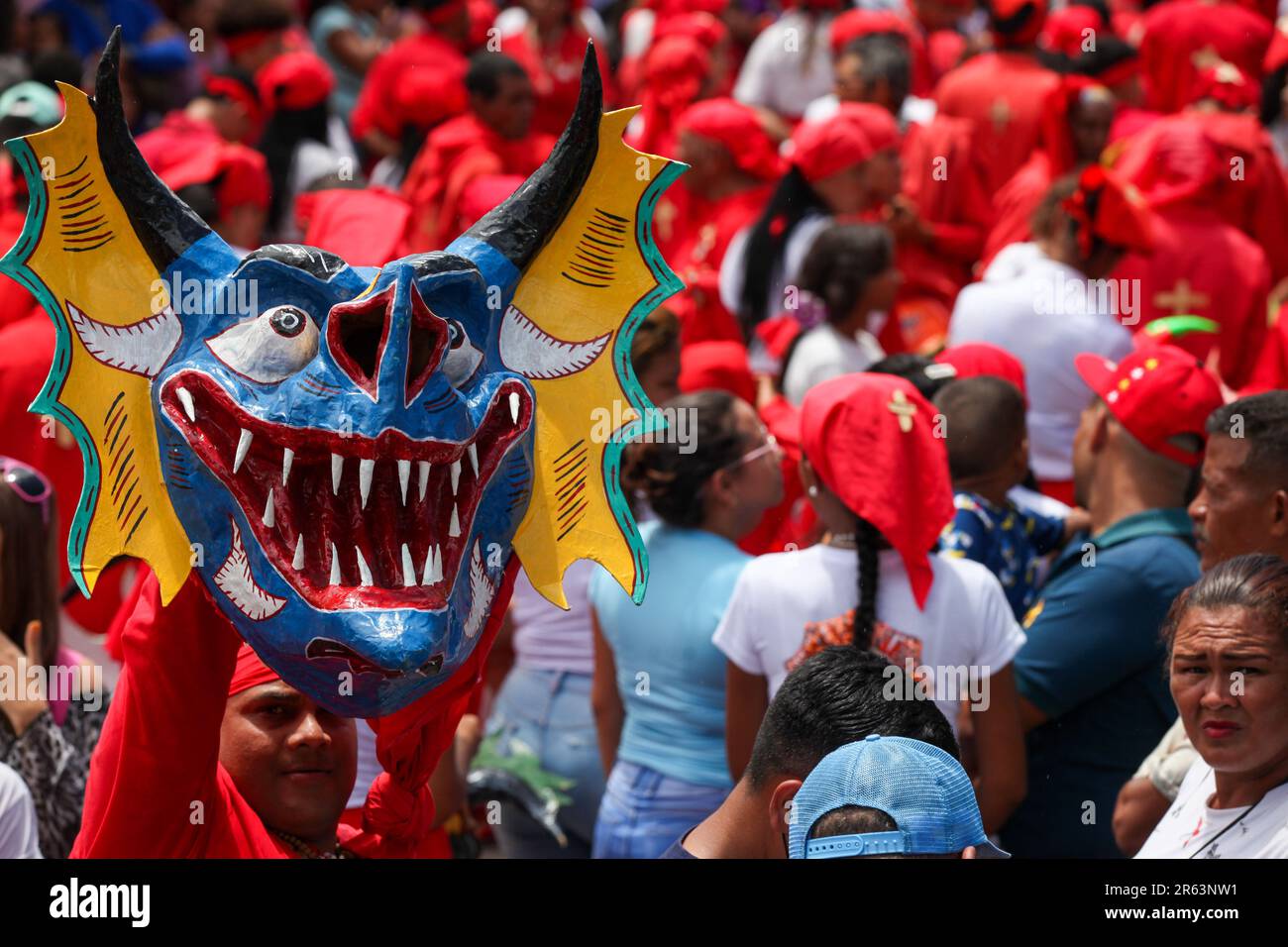 A Yare Devil displays his mask in the crowd. Every year on the ninth ...