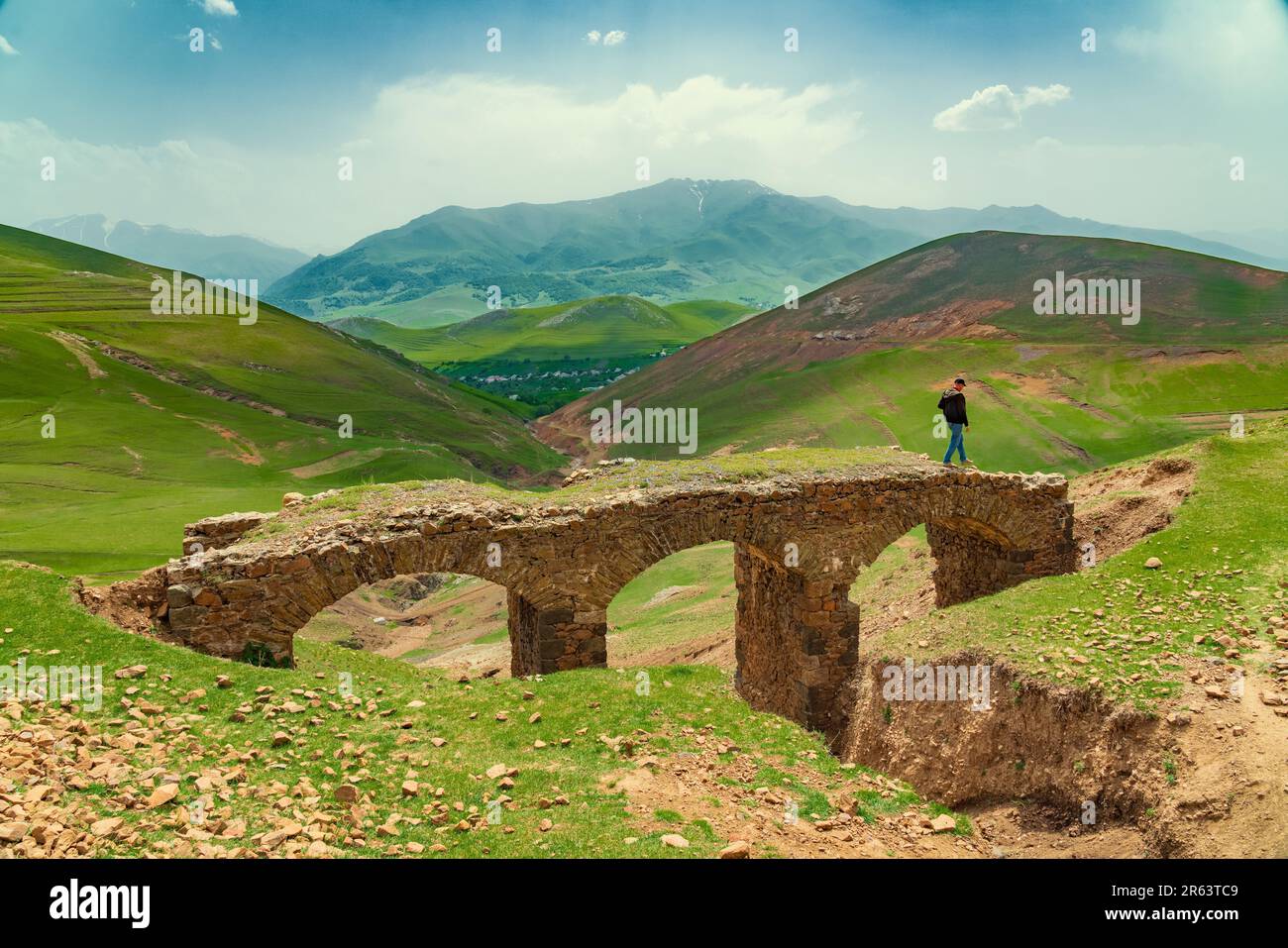 An ancient stone bridge in the suburbs of the city of Gadabay, built by ...