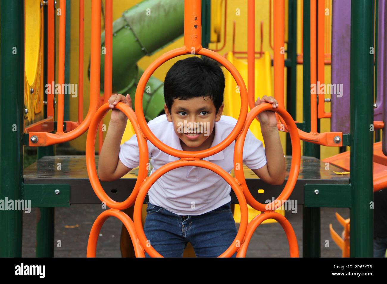 9-year-old Latino brown child boy plays in the park games lives in ...
