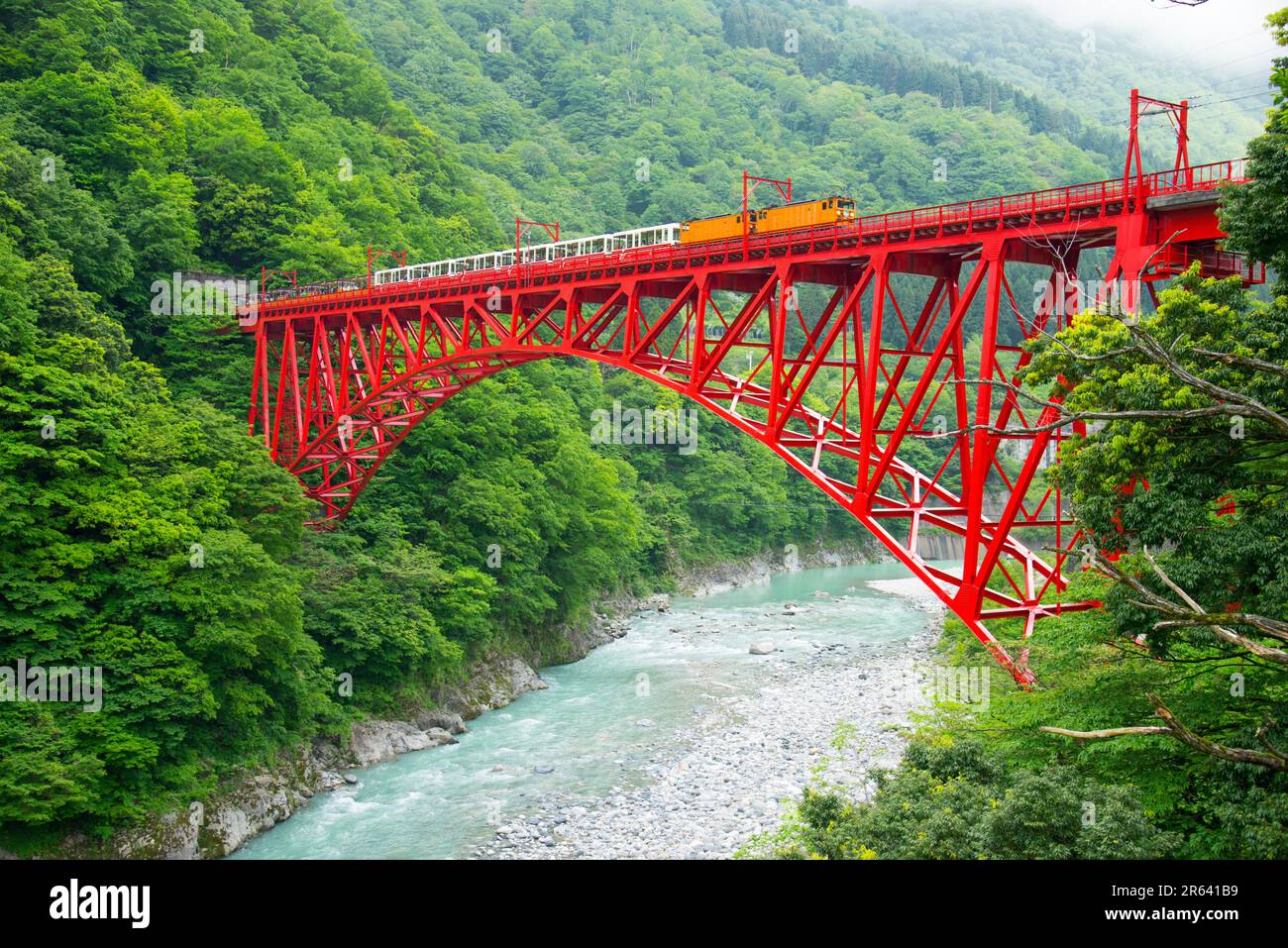 Kurobe Valley trolley car crossing the Shin Yamahiko Bridge Stock Photo ...