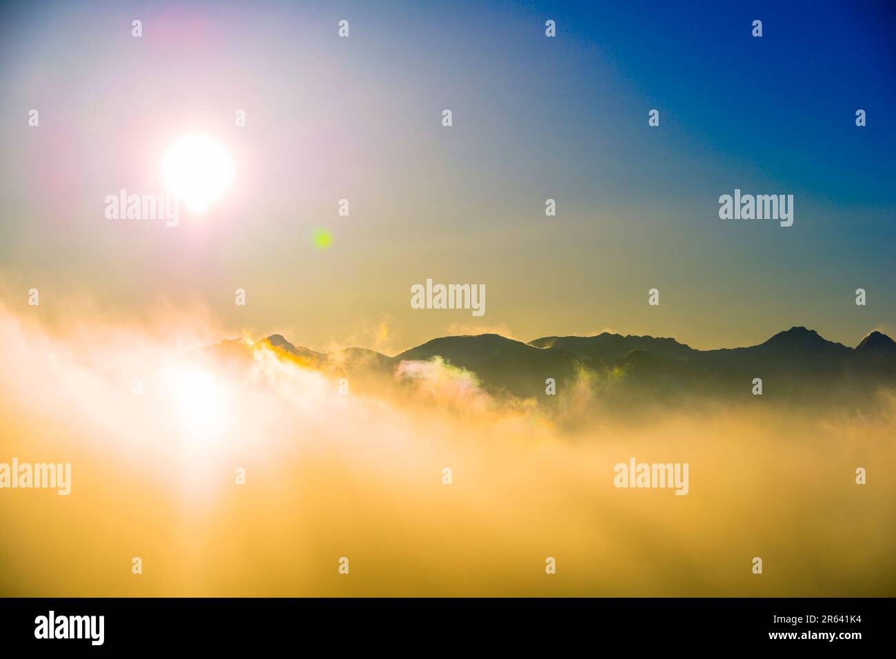 Sun pillar and Yatsugatake mountain range Stock Photo - Alamy
