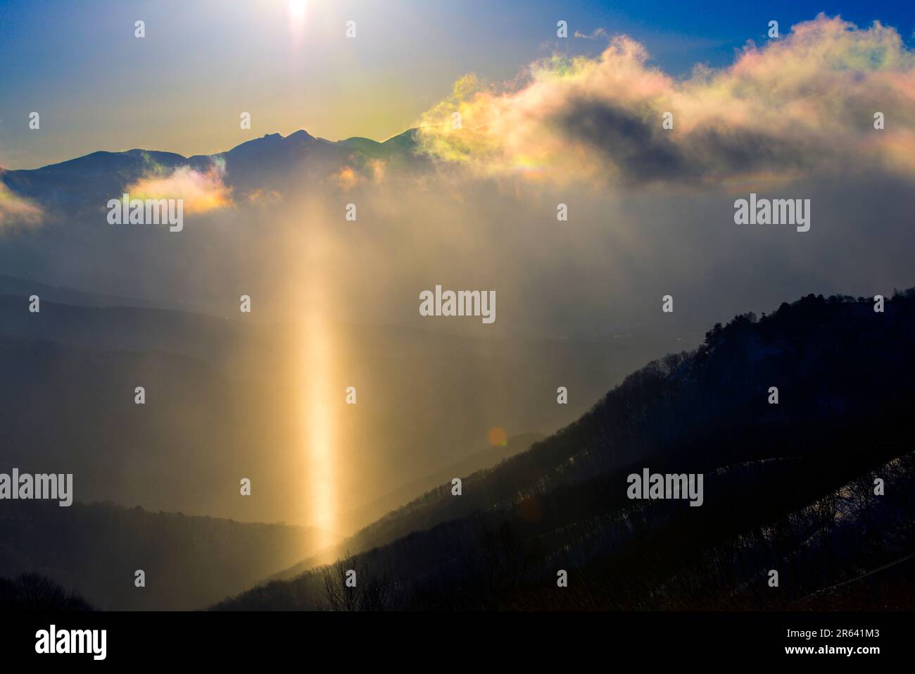 Sun pillar and Yatsugatake mountain range Stock Photo - Alamy