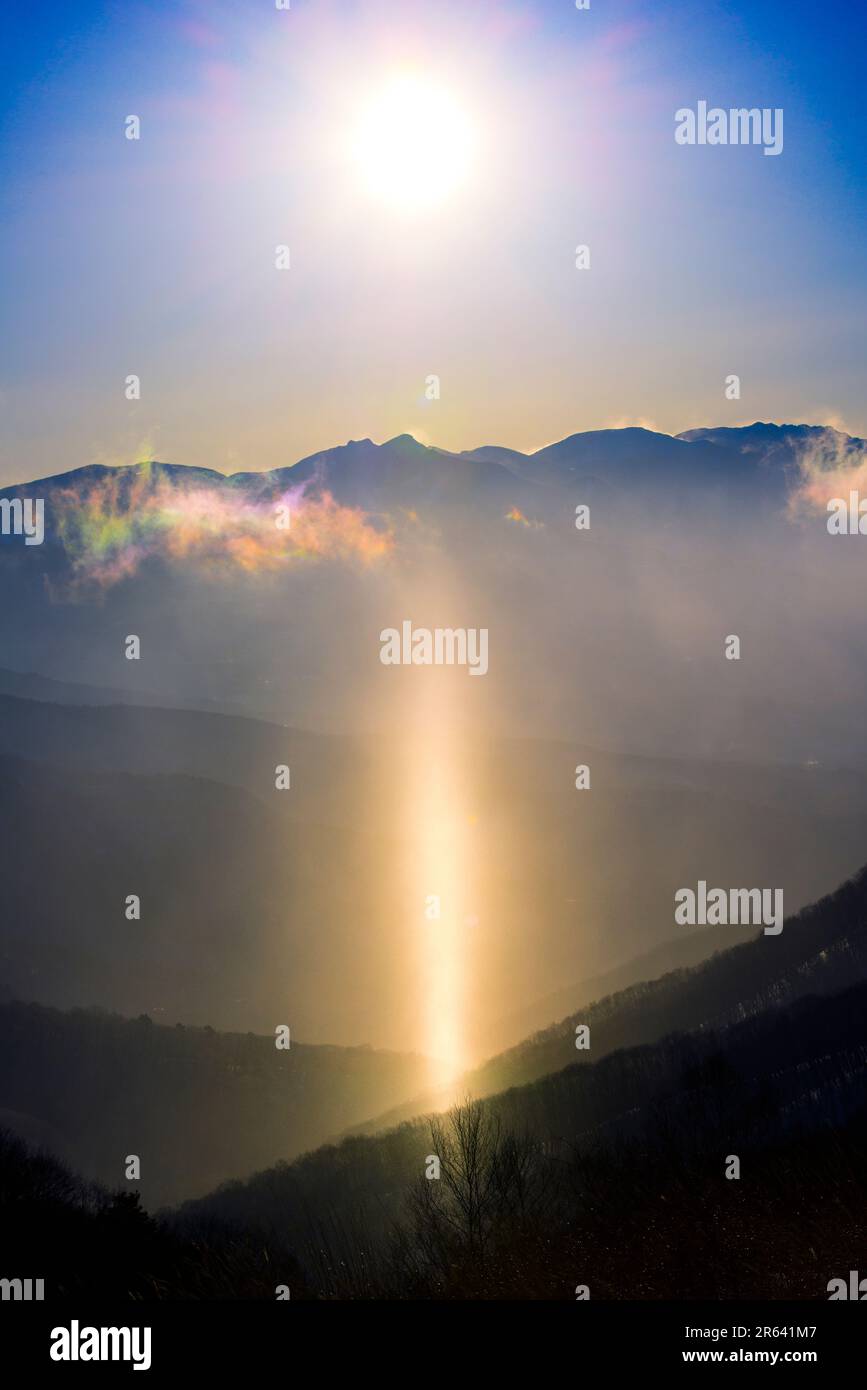 Sun pillar and Yatsugatake mountain range Stock Photo - Alamy