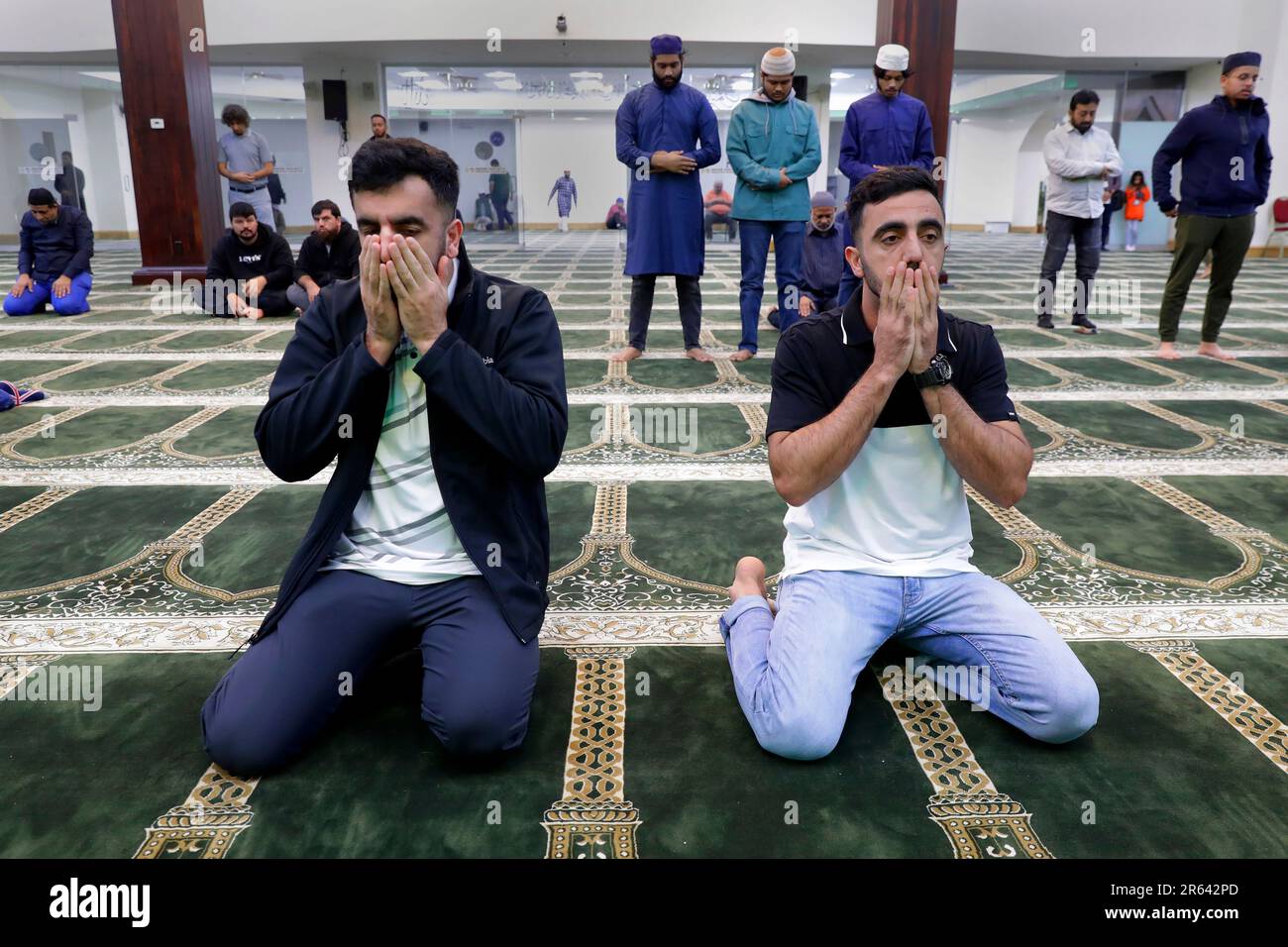 Brothers Samiullah Safi, left, and Abdul Wasi Safi pray during Friday ...