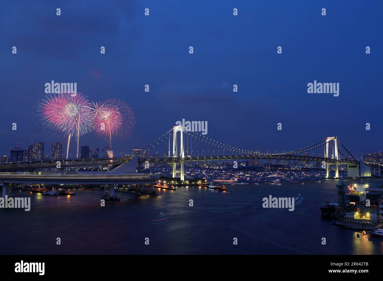 Rainbow Bridge and fireworks Stock Photo - Alamy