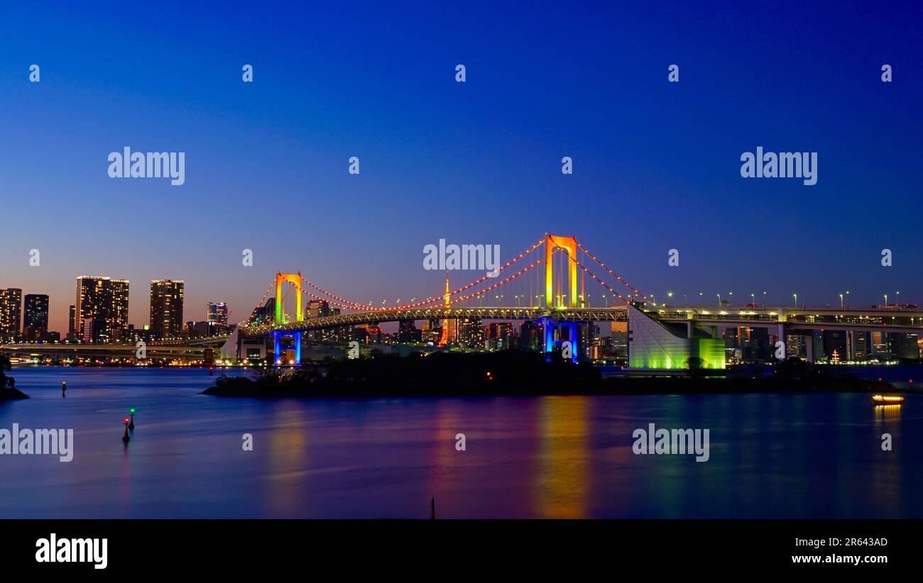Illuminated Rainbow Bridge Stock Photo - Alamy