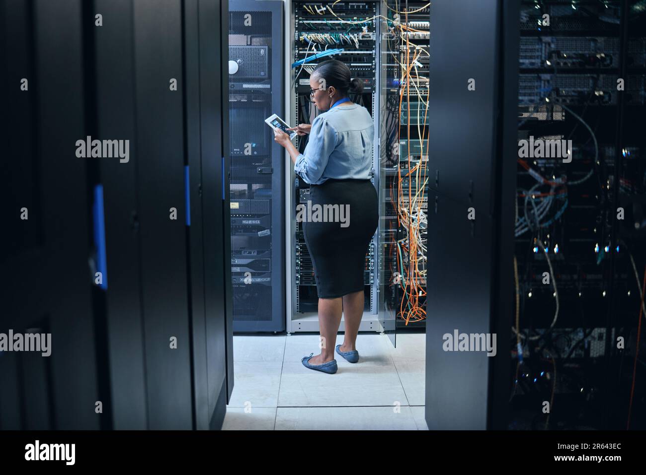 Woman Server Room And Engineer With A Tablet For Programming System Upgrade Or Cable