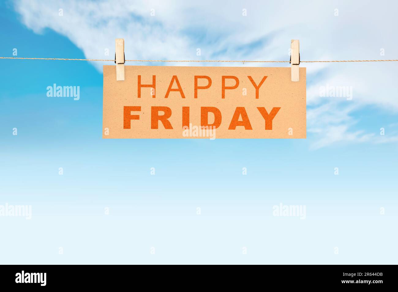 Paper hanging on the rope with Happy Friday text. Happy Friday concept ...