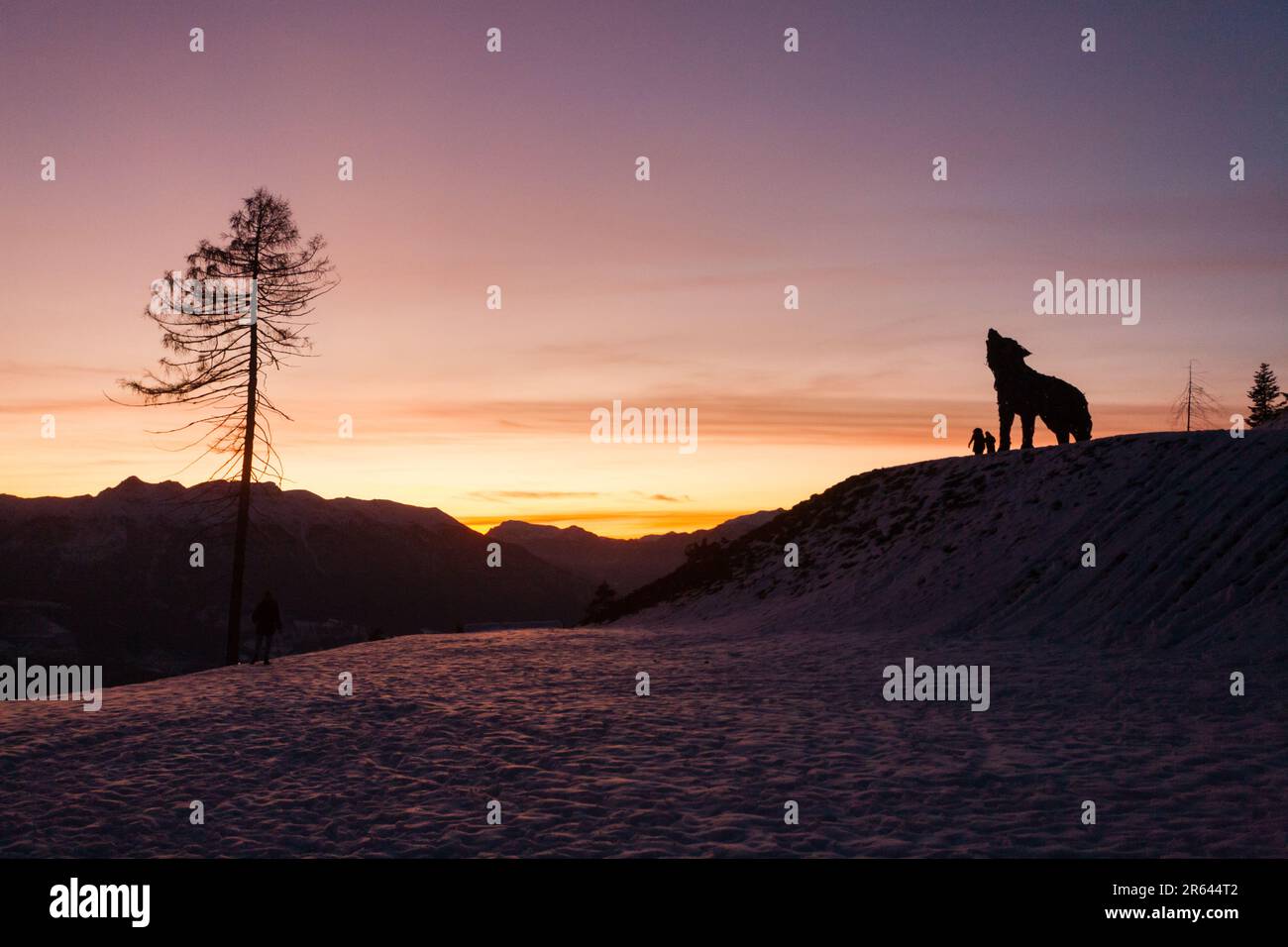 Wooden sculpture of a wolf made of tree branches. Vaia tempest wolf ...