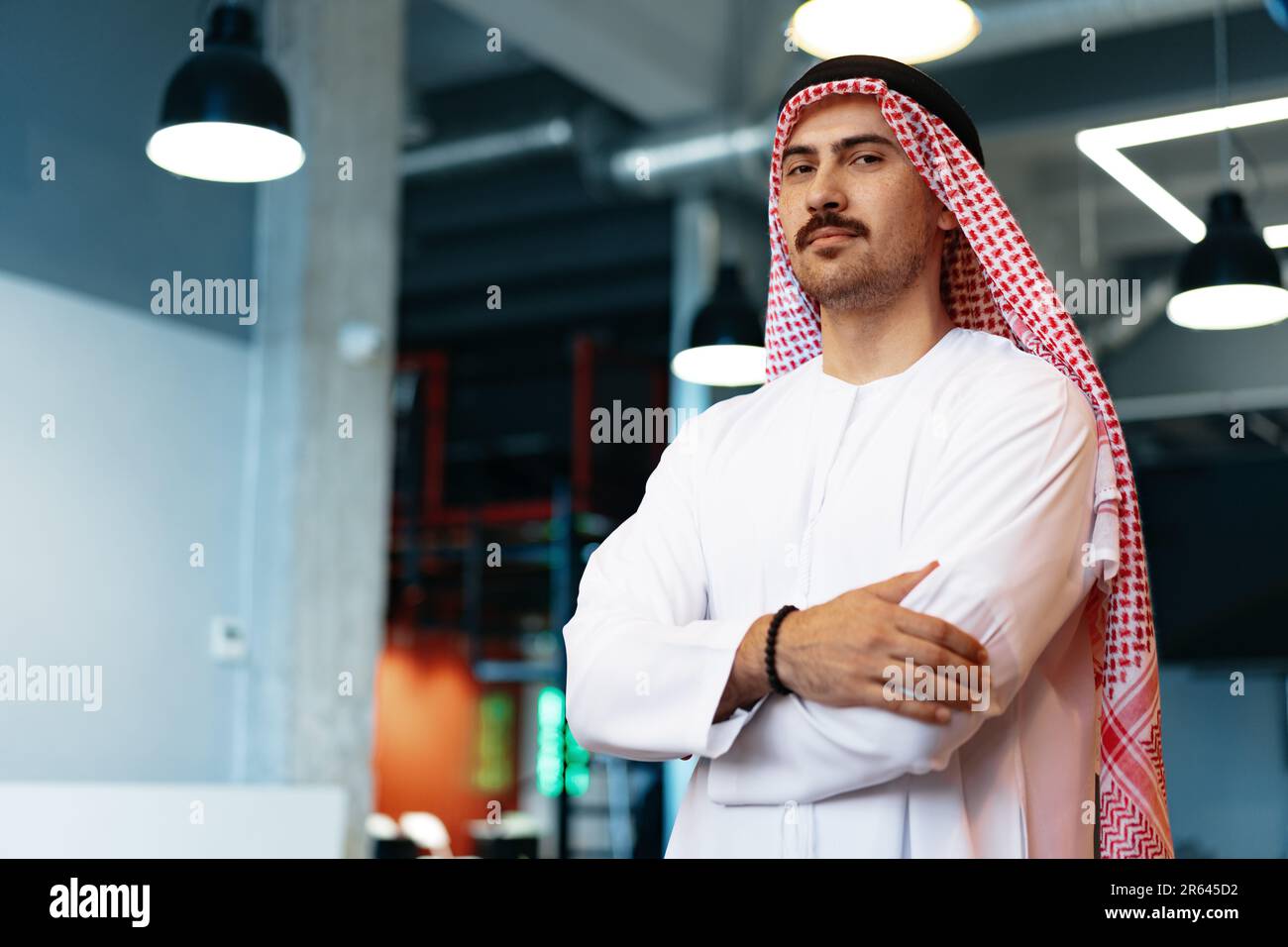 Successful muslim businessmen in traditional outfit in his office Stock ...