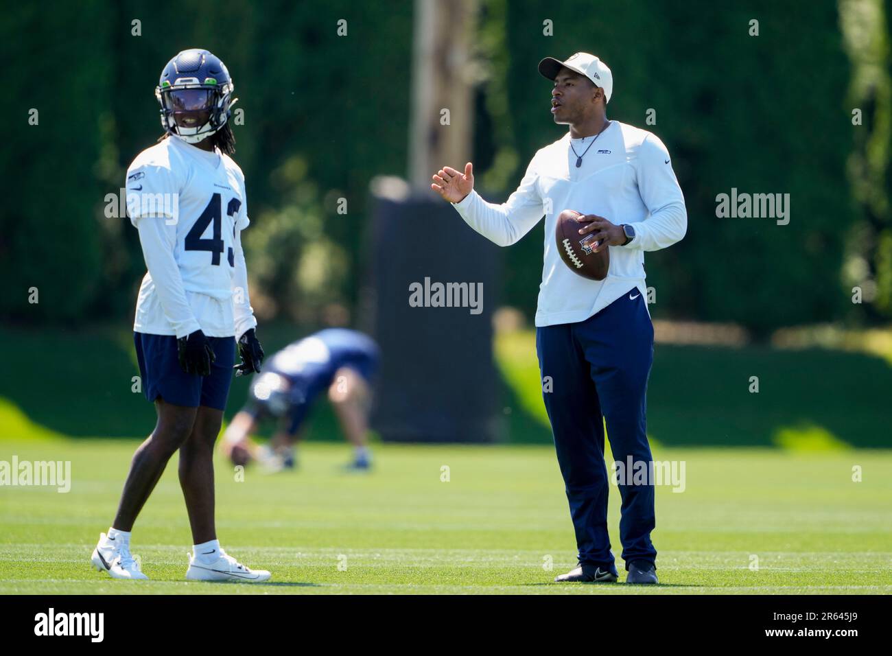 Seattle Seahawks cornerback Montrae Braswell (43) looks on as assistant ...