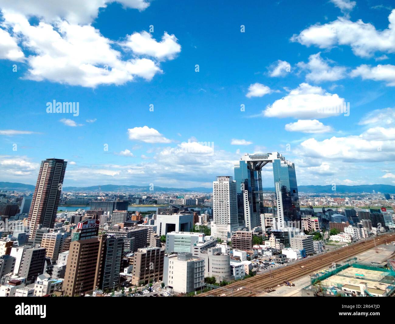 Umeda Sky Building and white clouds Stock Photo - Alamy