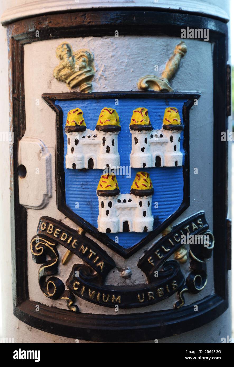 The Dublin Coast Of Arms Burning Castles sign Stock Photo - Alamy