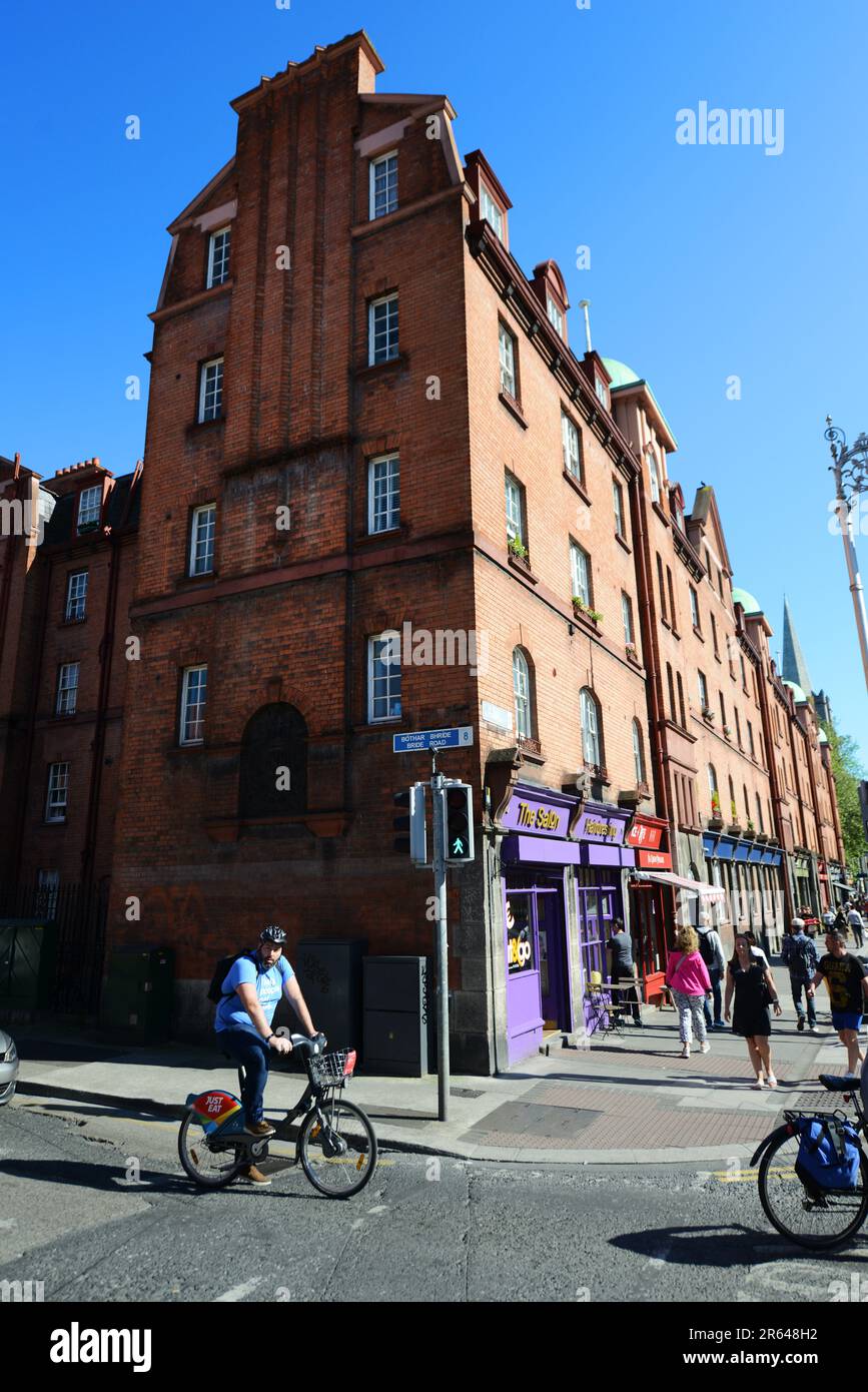 An old red brick residential building on the corner of Patrick St, and ...