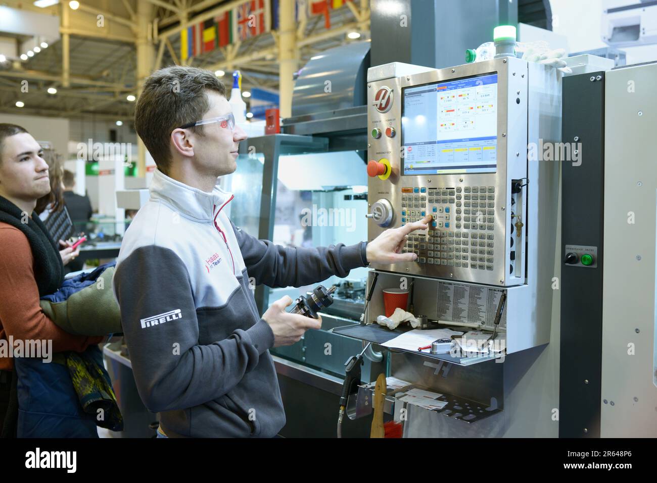 Man worker working with a CNC milling machine, stand. Industry ...