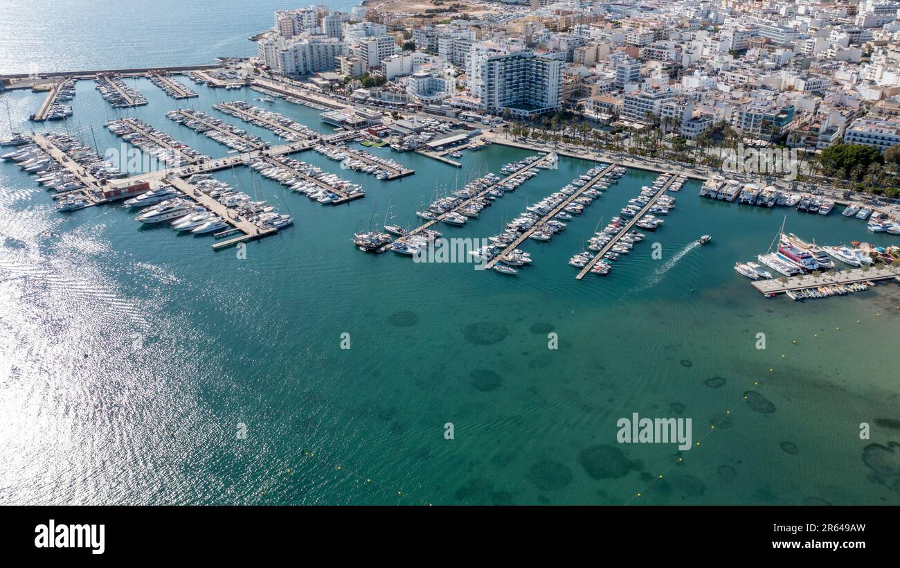 Aerial drone photo of the town of Sant Antoni on the island of Ibiza in ...