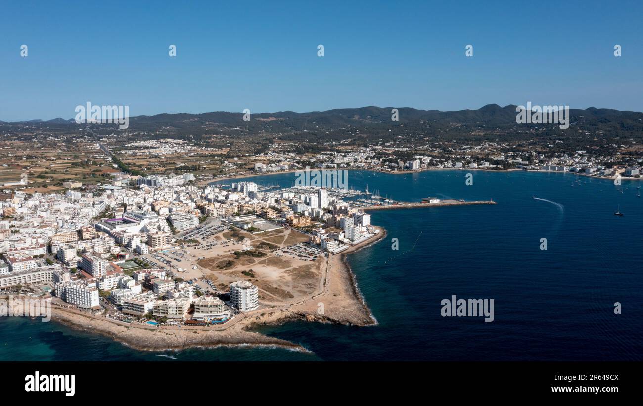 Aerial drone photo of a beach in the town of Sant Antoni de Portmany on ...
