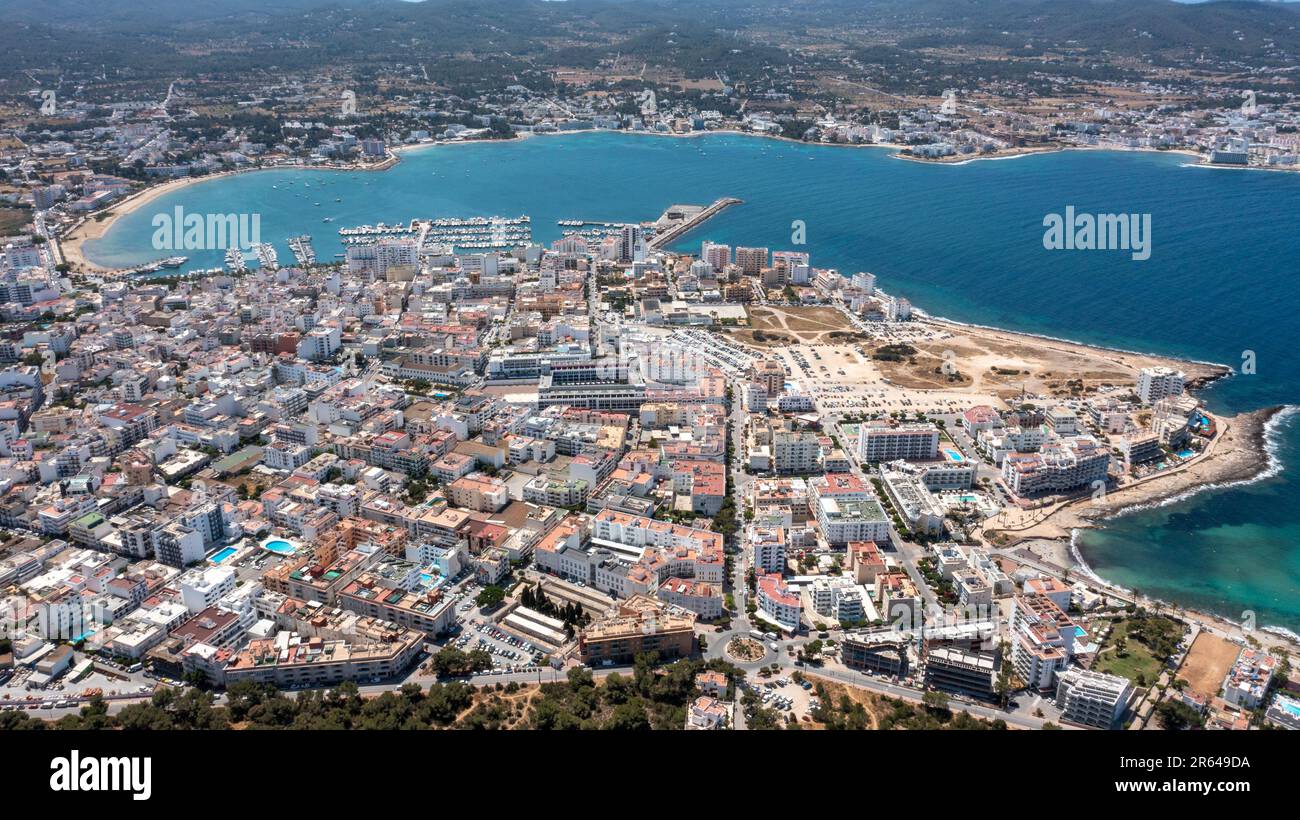 Aerial drone photo of a beach in the town of Sant Antoni de Portmany on ...