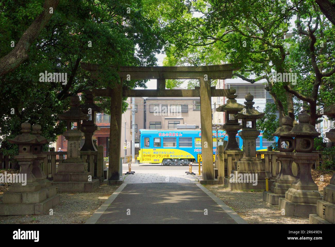 Torii gate of Sumiyoshitaisha Shrine and Hankai Railway Stock Photo - Alamy