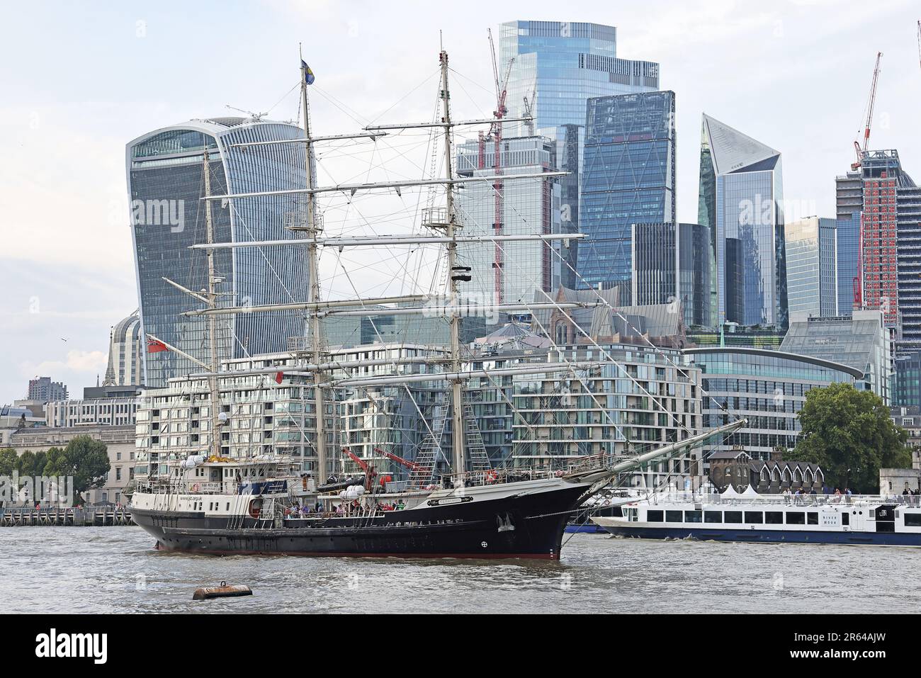 Tall sailing ship with City of London, UK Stock Photo - Alamy