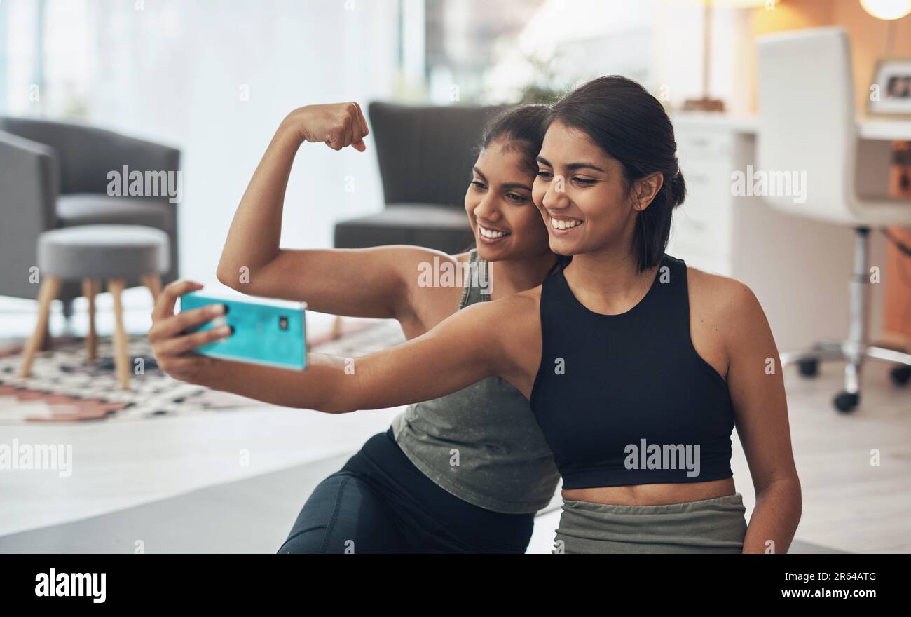 Fitness, friends and strong muscle selfie of women together at home for ...