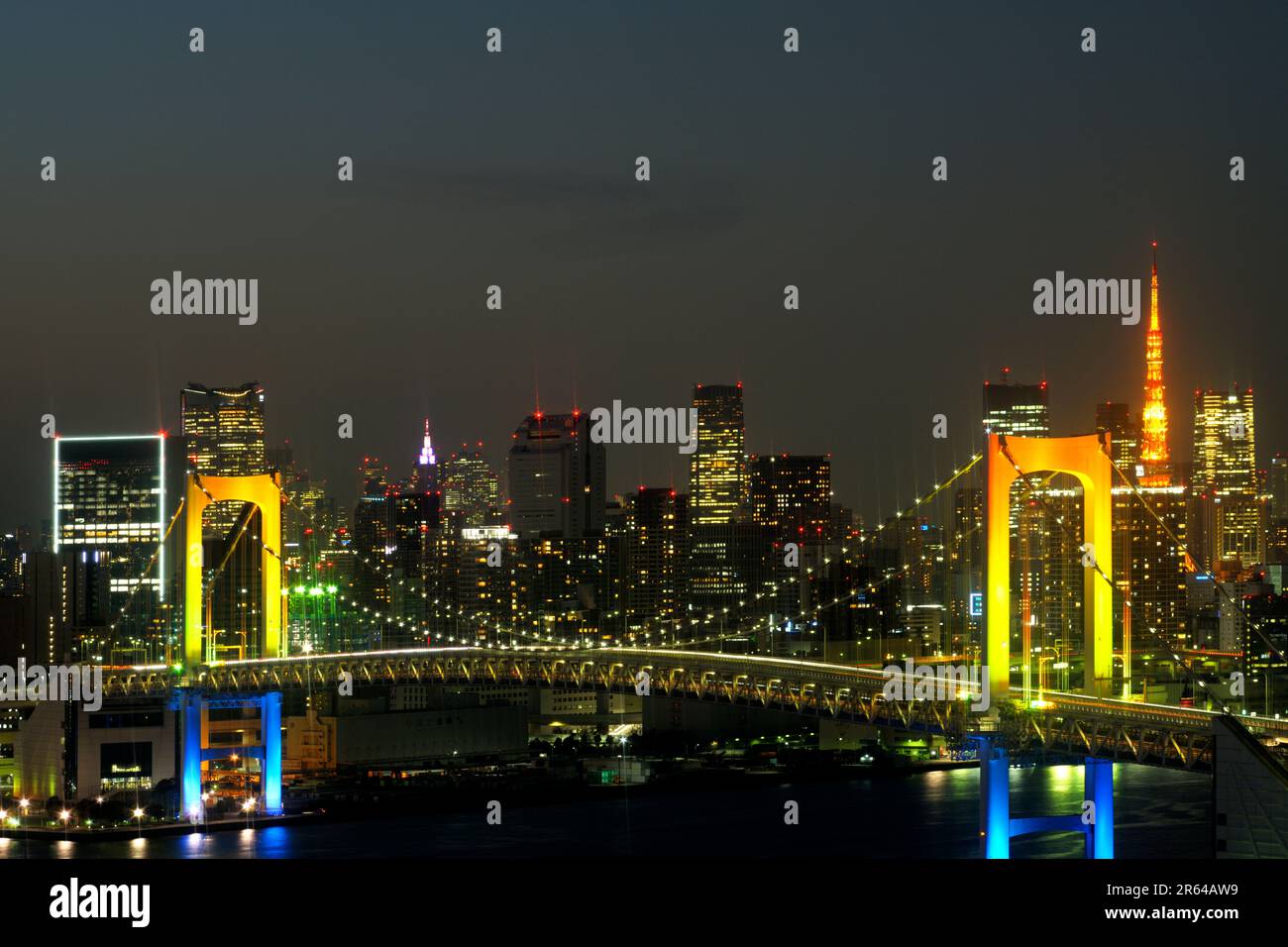 Illuminated Rainbow Bridge and Tokyo Tower Stock Photo - Alamy