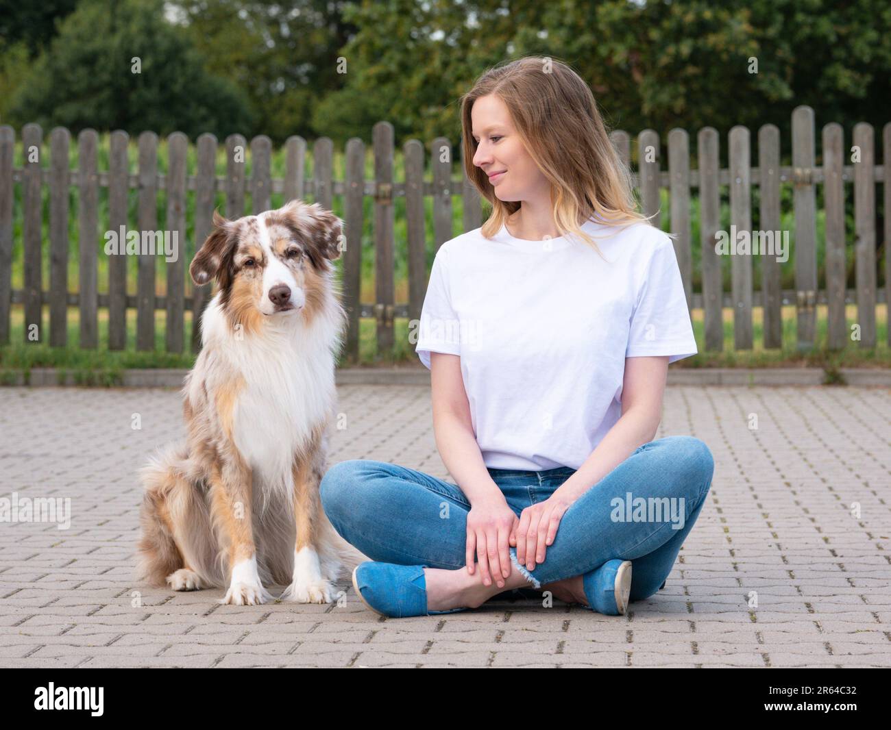 Woman with Australian Shepherd Dog Outside Mockup Shirt sitting smiling ...