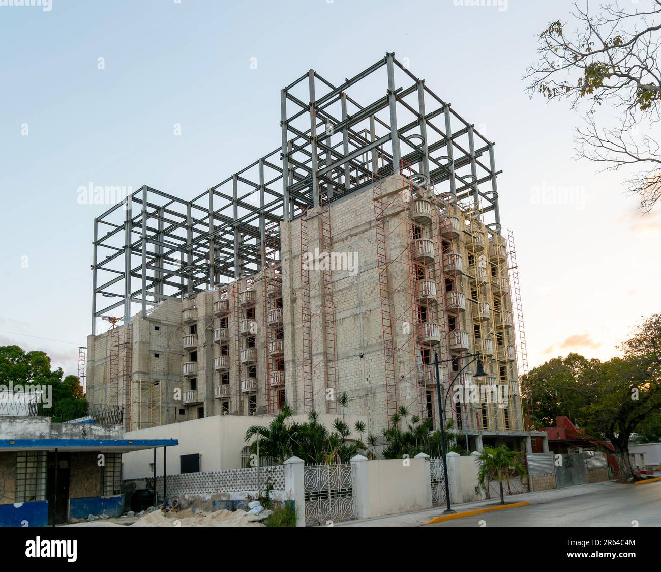 Construction site new steel framed apartment block building in city ...