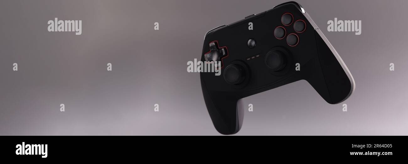 Black modern gaming joystick for video games Stock Photo - Alamy