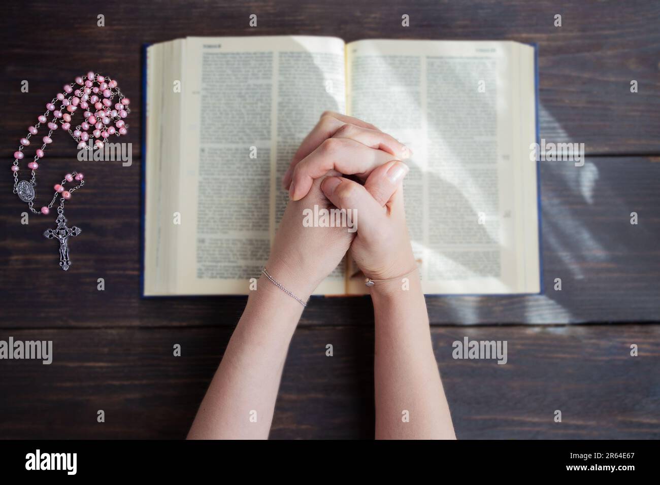 Open folded hands hi-res stock photography and images - Alamy