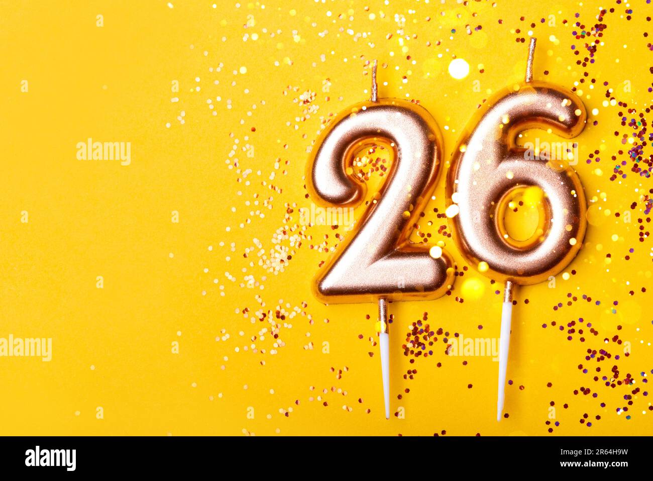 26 years celebration. Greeting banner. Gold candles in the form of ...