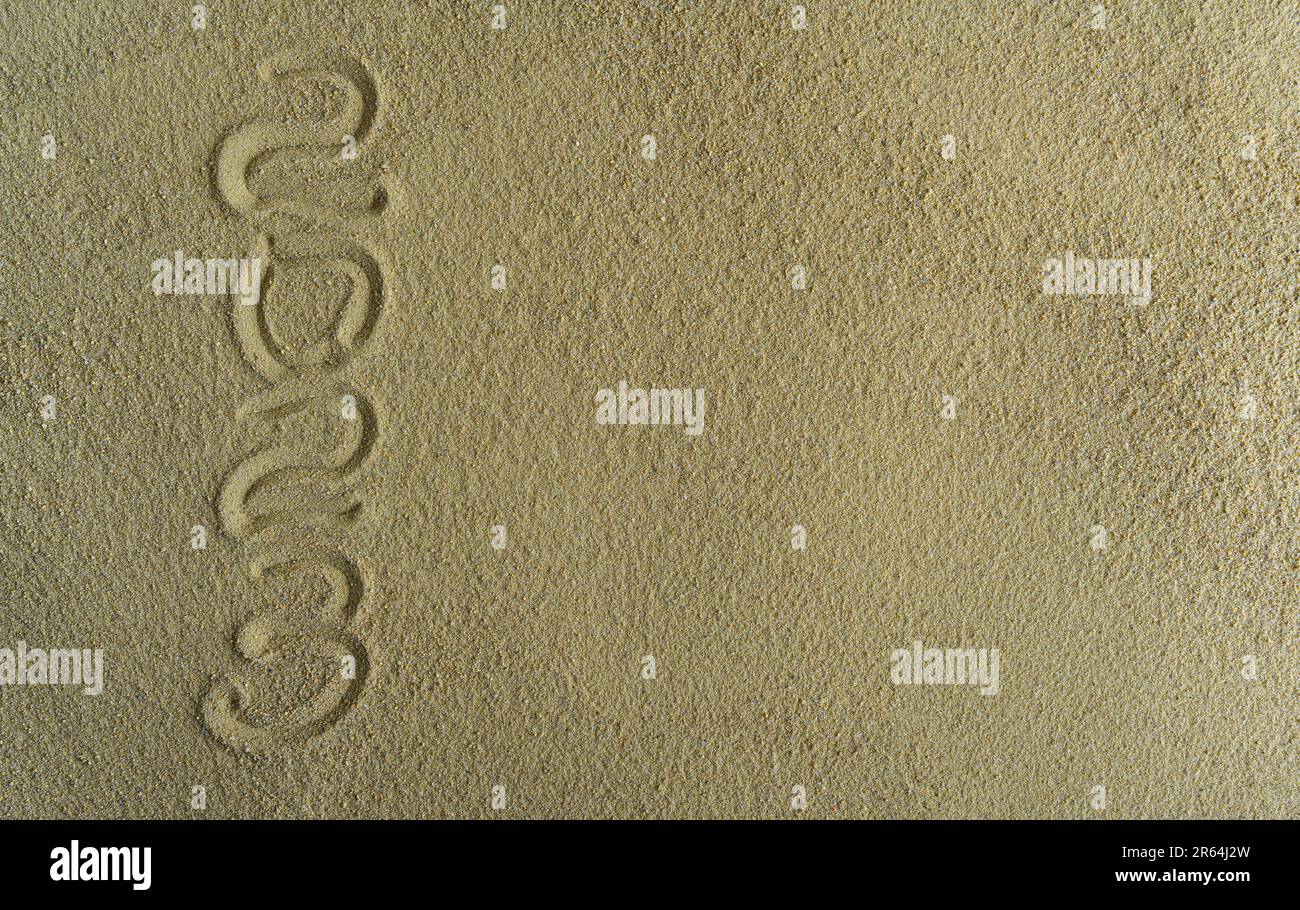 Signpost 2023 written in sand Stock Photo - Alamy