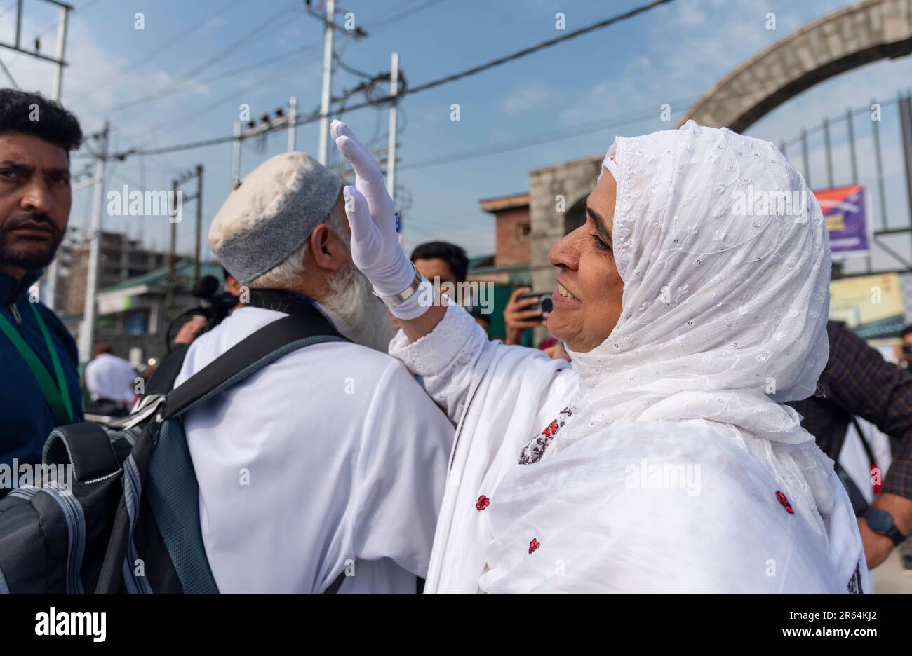 Srinagar, India. 07th June, 2023. A pilgrim is seen waving at her ...
