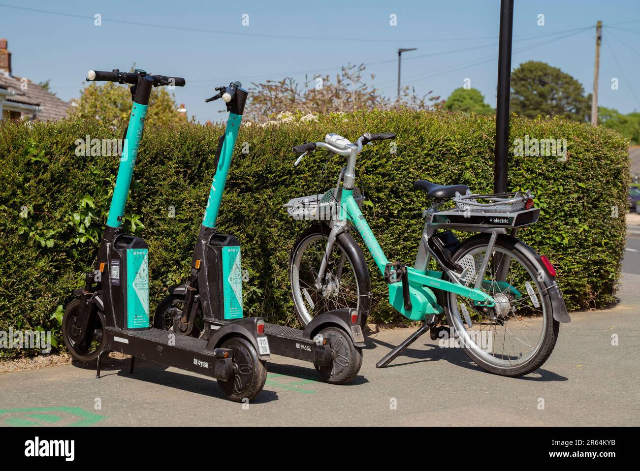 Beryl electric bike and Beryl electric scooters on a street corner in Newport, Isle of Wight ...