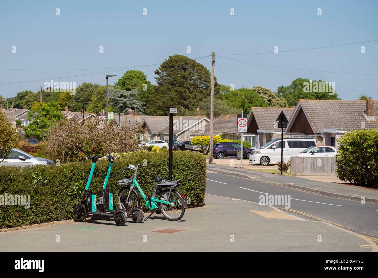 Beryl electric bike and Beryl electric scooters on a street corner in Newport, Isle of Wight ...